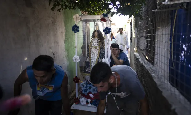 Catholic-devotees-carry-a-statue-of-Our-Lady-of-Caacupe-in-Buenos-Aires ...